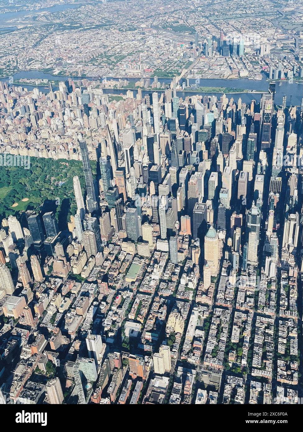 Aerial view of midtown Manhattan, Central Park and Upper East Side in foreground and Roosevelt ...