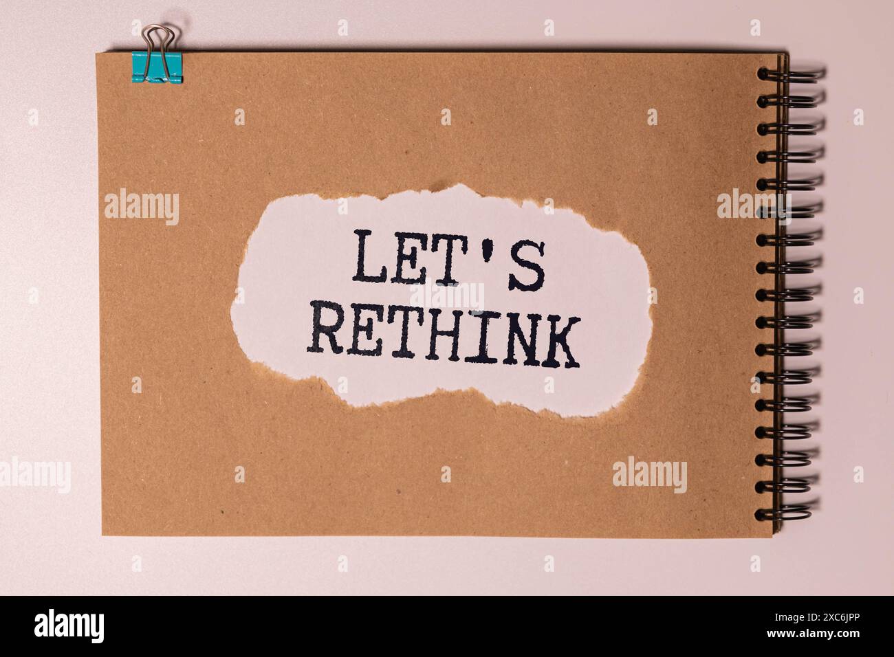 LET'S RETHINK word on a notebook on grey background Stock Photo - Alamy