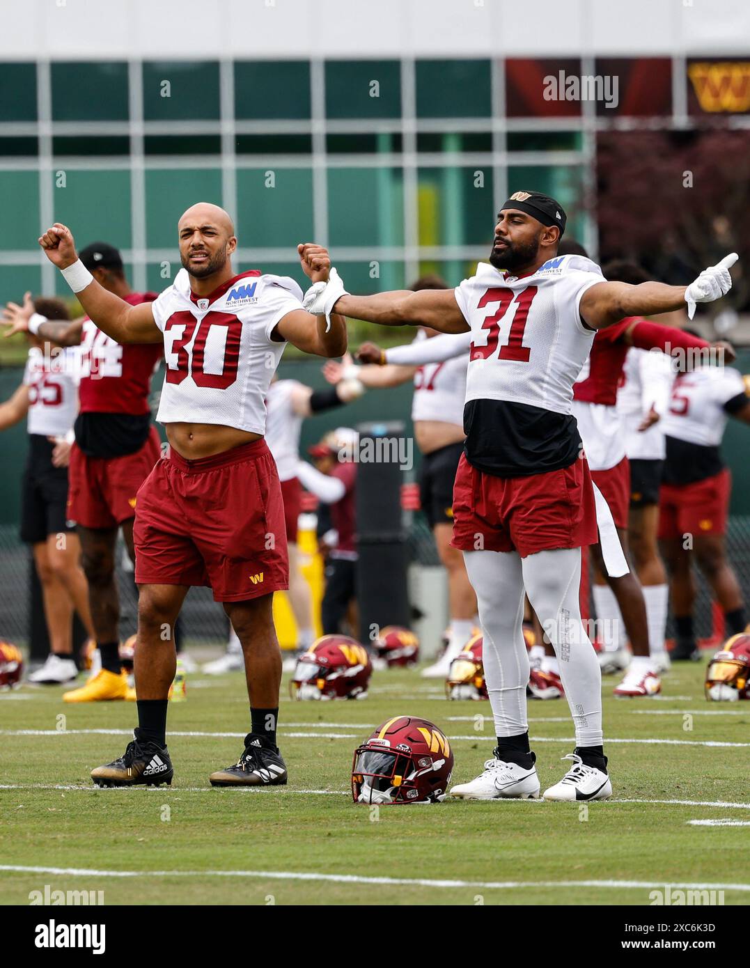 Washington Commanders running back Austin Eckler (30) and Jeremy ...
