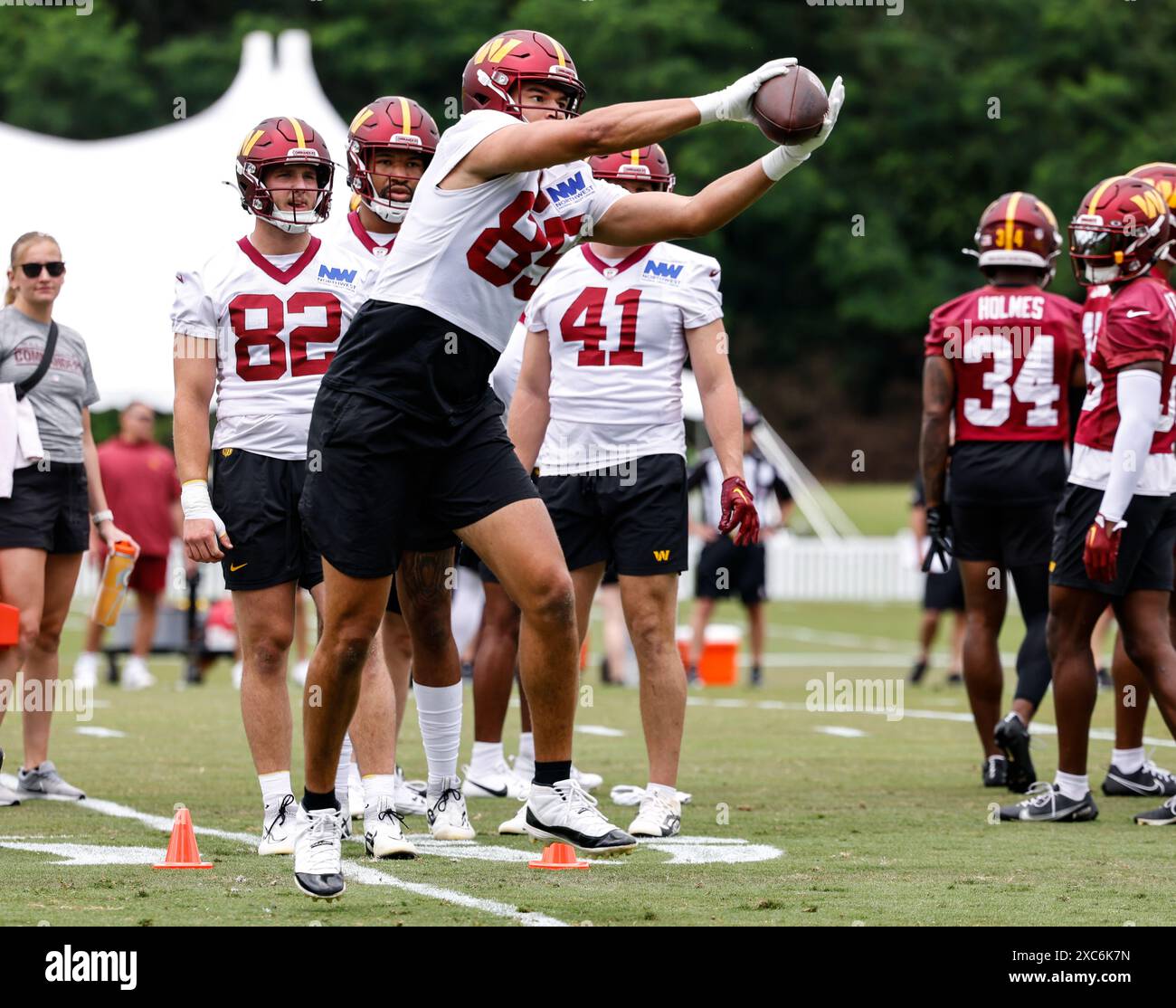Washington Commanders tight end Cole Turner (85) performing drills at ...