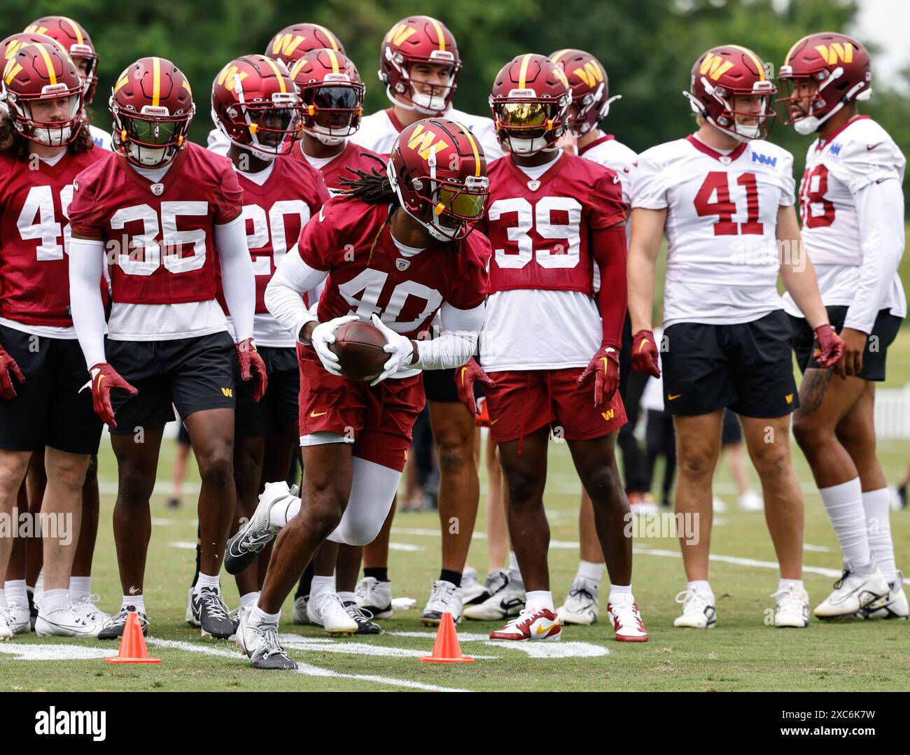 Washington Commanders safety Tyler Owens (40) performing drills at mini ...