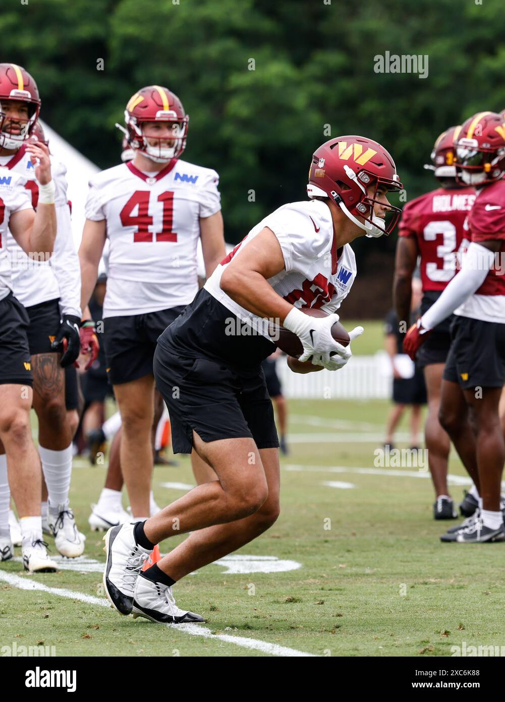 Washington Commanders tight end Cole Turner (85) performing drills at ...