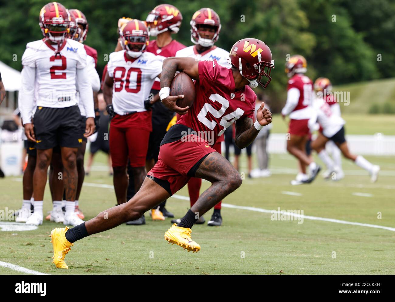 Washington Commanders cornerback Michael Davis (24) performing drills at mini camp at the ...