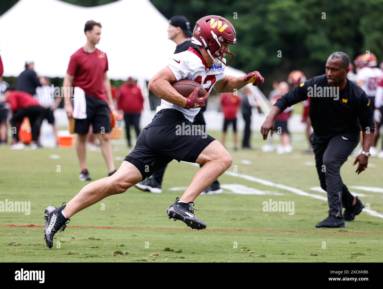 Washington Commanders wide receiver Luke McCaffrey (12) performing ...