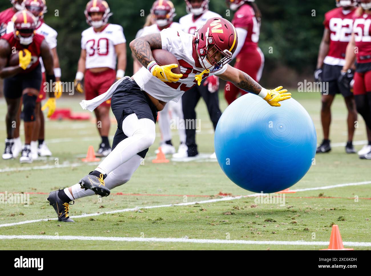 Washington Commanders running back Chris Rodriguez (23) performing ...