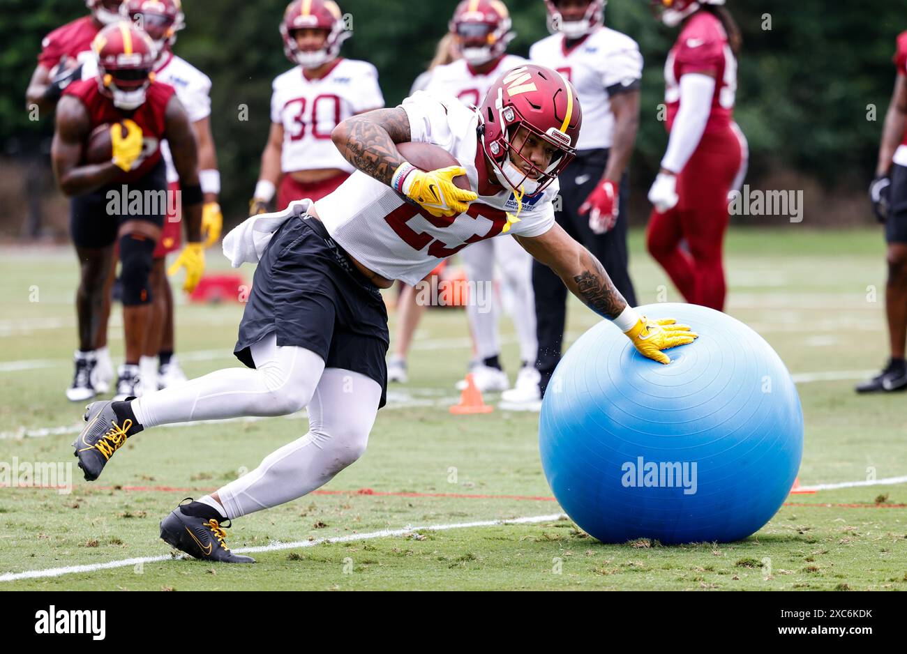 Washington Commanders running back Chris Rodriguez (23) performing drills at mini camp at the ...