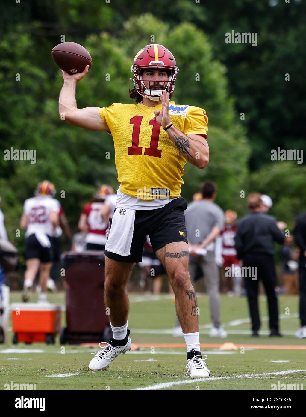 Washington Commanders quarterback Sam Hartman (11) performing drills at ...