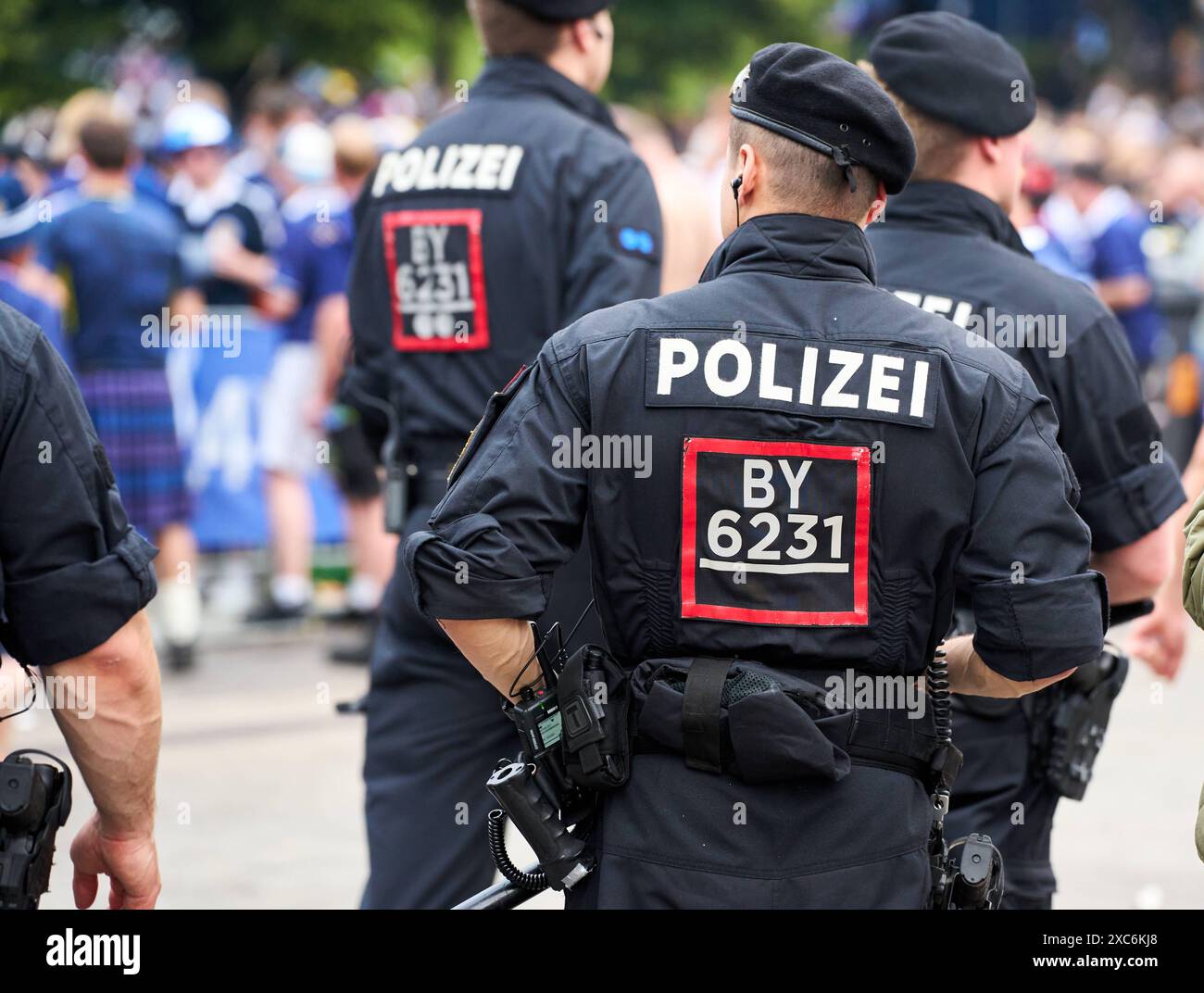 Munich, Bavaria, Germany - June 14, 2024: Police officers on standby to ...