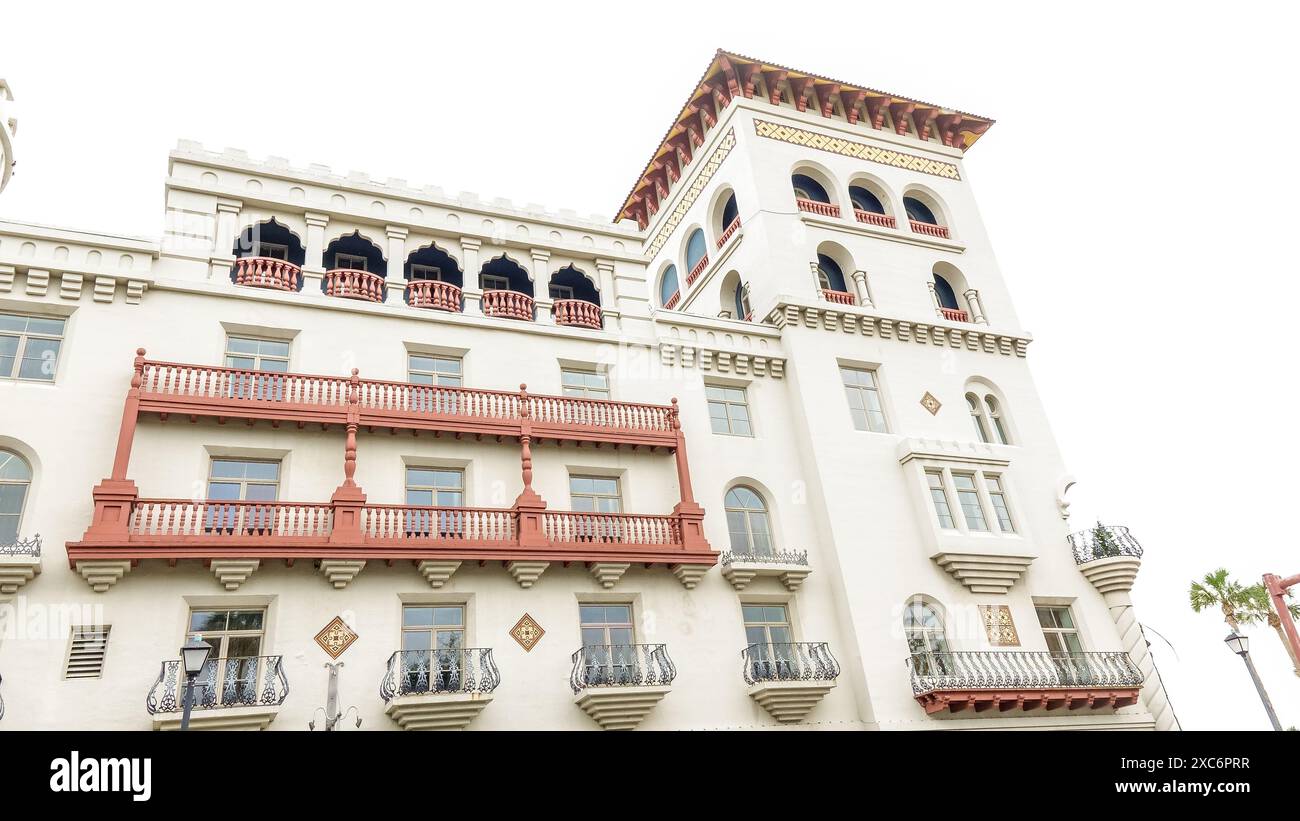 Spanish Mission Revival Style Building with Balconies and Arched ...
