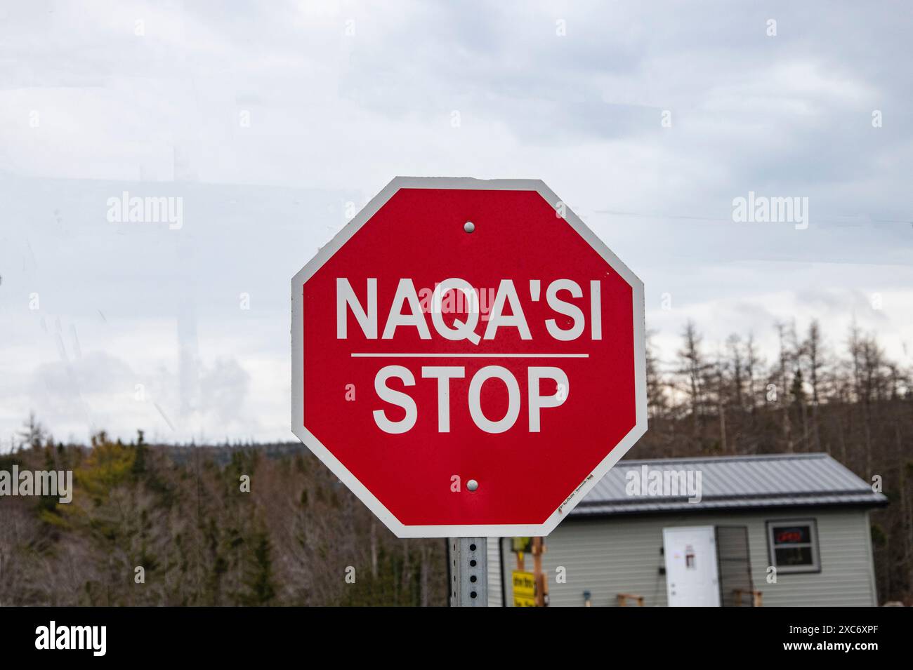Bilingual stop sign in Potlotek, Nova Scotia, Canada Stock Photo - Alamy