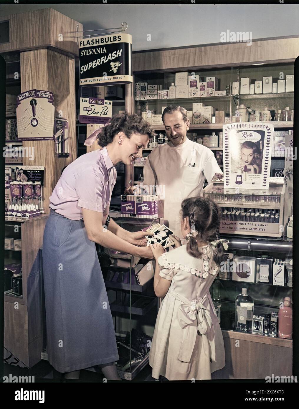 Camera film processing at a drug store in 1953. Image from original 4x5 ...