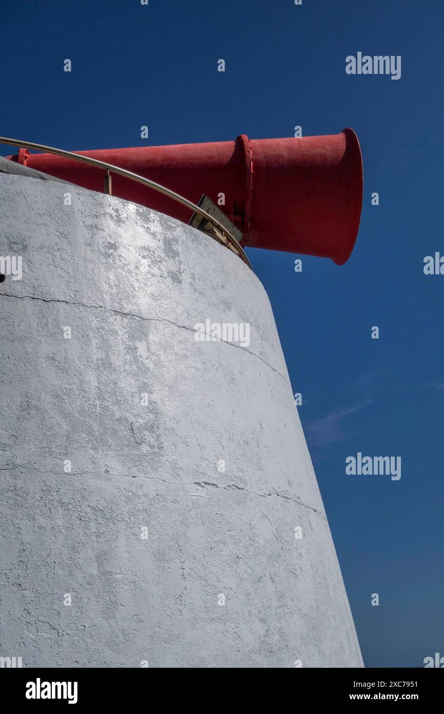 Metallic radar installation with red horn, shining in the sunlight ...