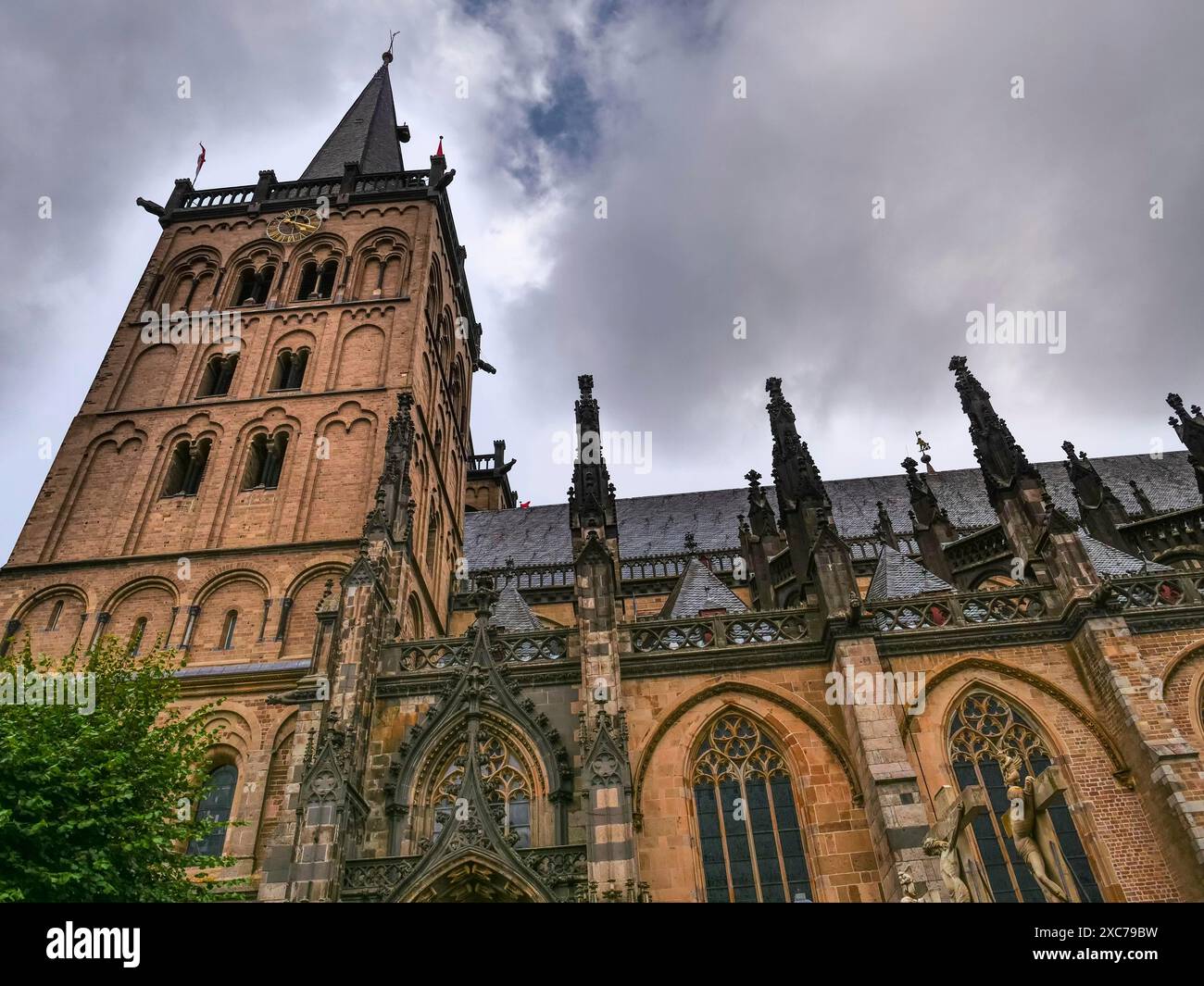 Dramatic view of a Gothic cathedral with high towers and historical ...