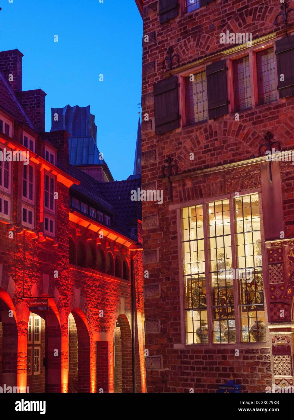 Picturesque view of the old town at night with illuminated red brick ...
