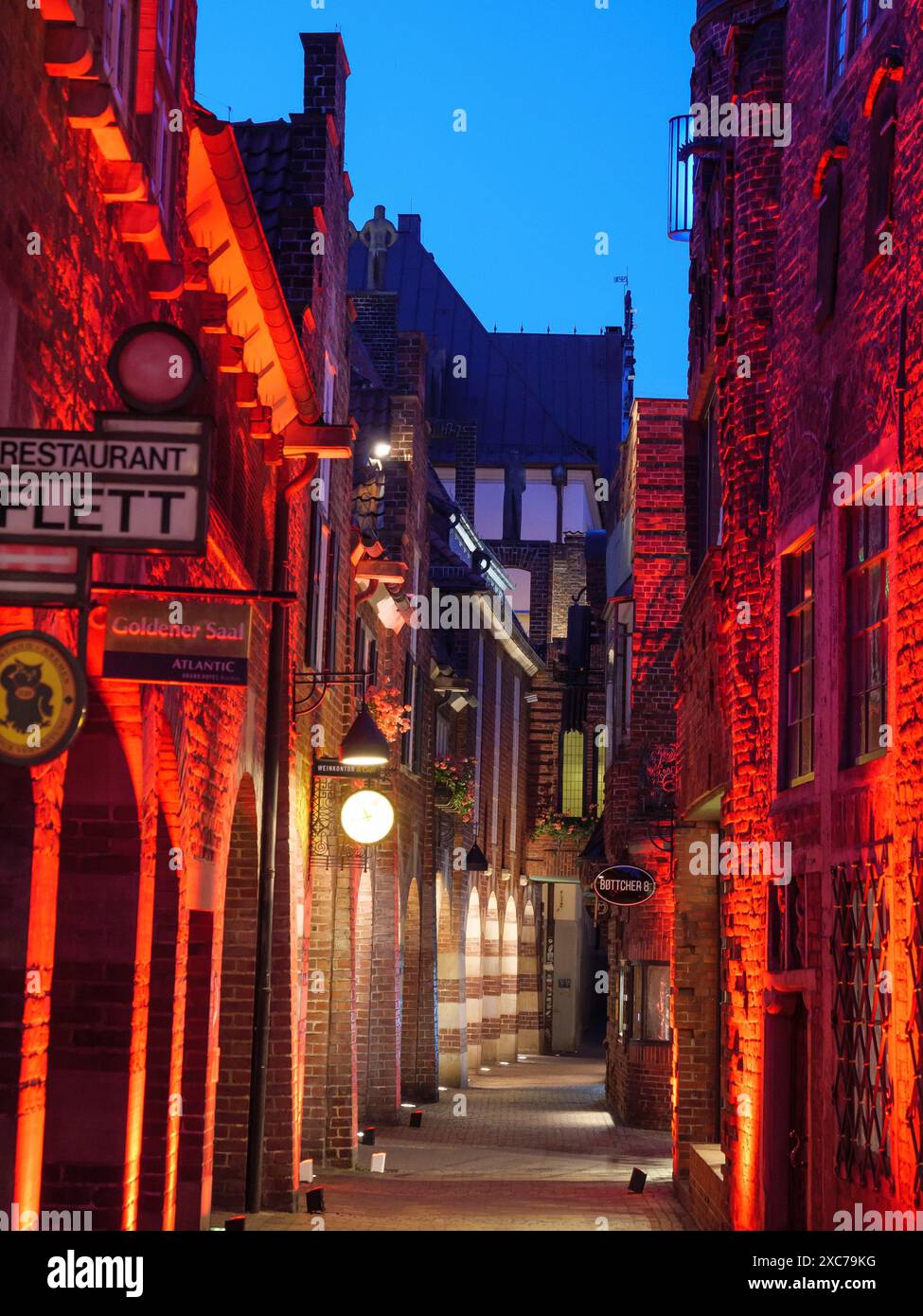 Illuminated old town centre with half-timbered houses and various ...