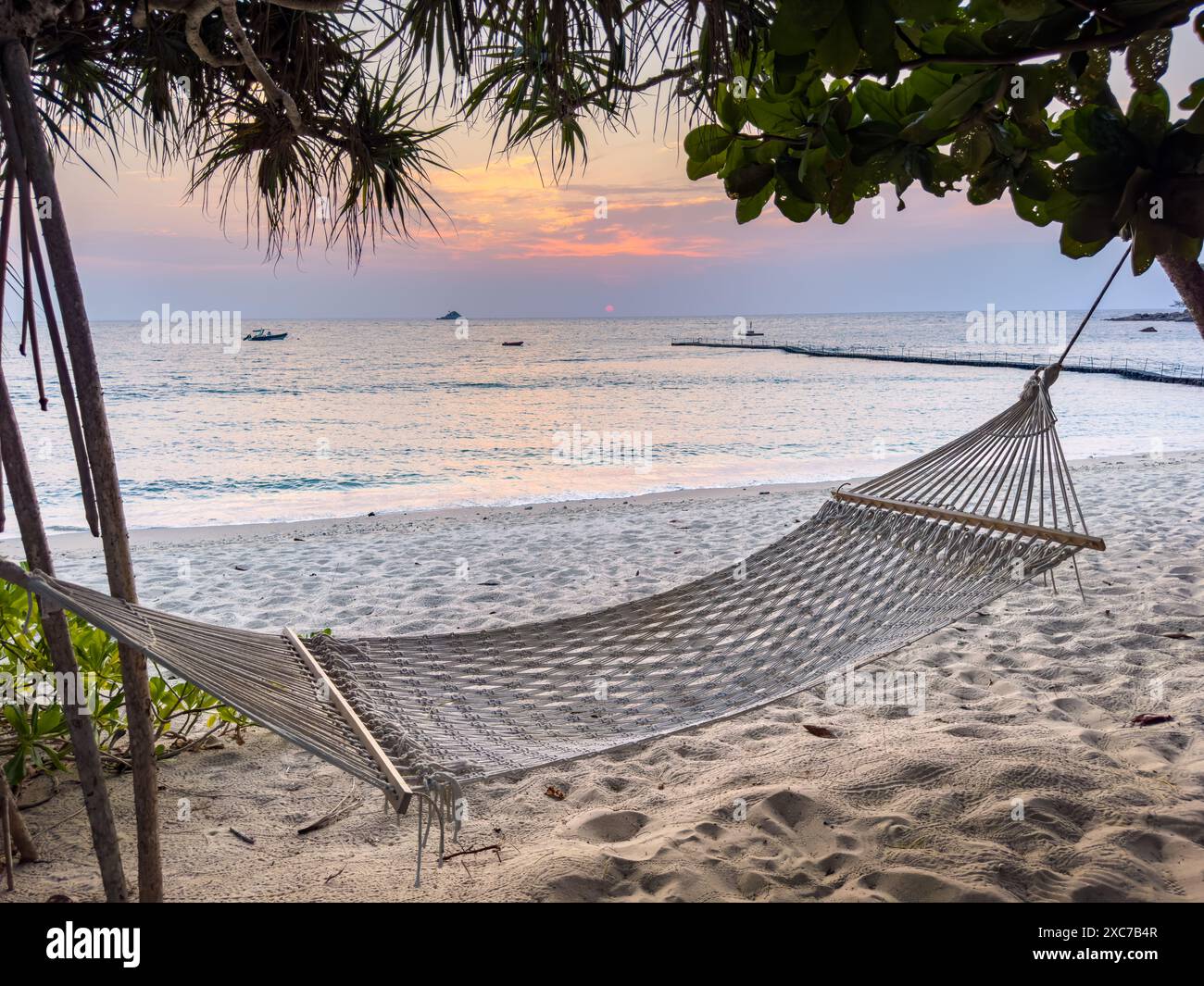 Relaxing in a hammock on the beach in Bang Tao, Phuket, Thailand Stock ...