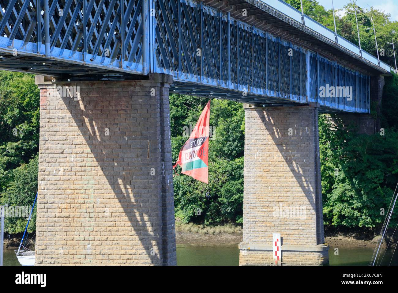 Port Rhu marina, Stop Genocide flag with Palestine flag hanging under ...