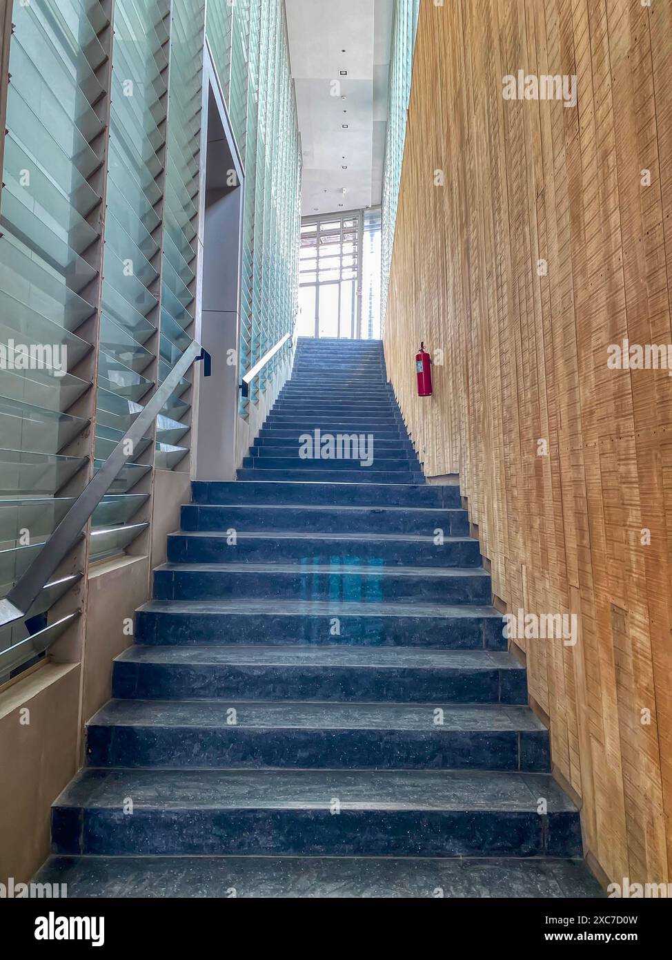 Building stairs with a fire extinguisher for use in emergencies Stock ...