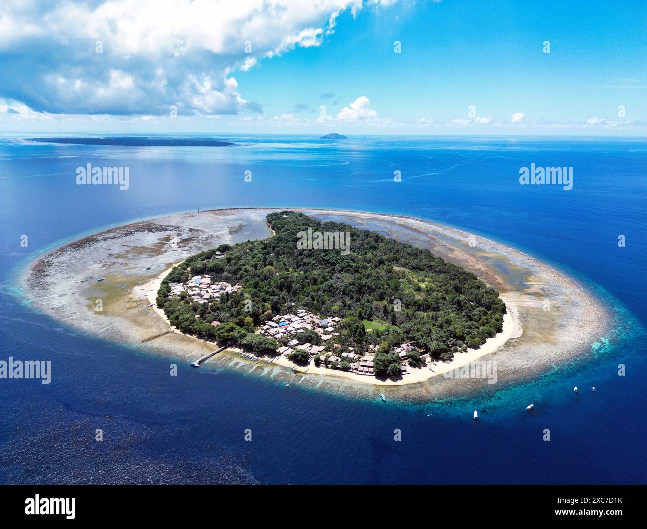 Indonesia Bunaken - Drone view Siladen Island with coral reef Stock ...