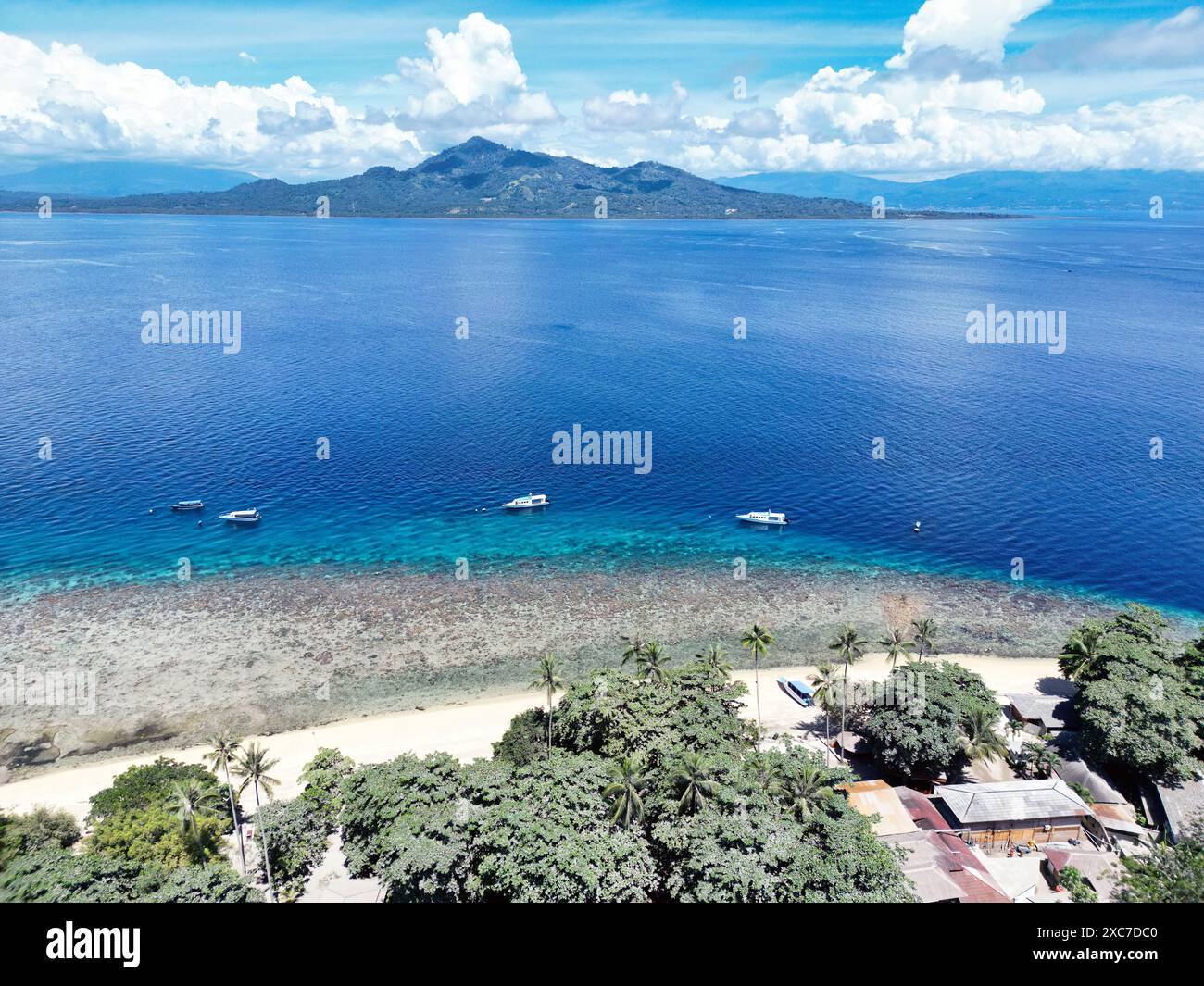 Indonesia Bunaken - Drone view Siladen Island with coral reef Stock ...
