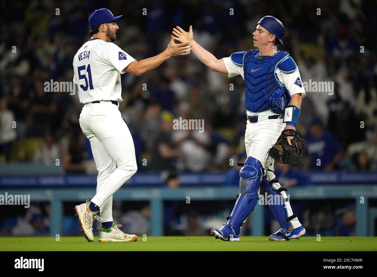 Los Angeles Dodgers relief pitcher Alex Vesia, left, and catcher Will ...
