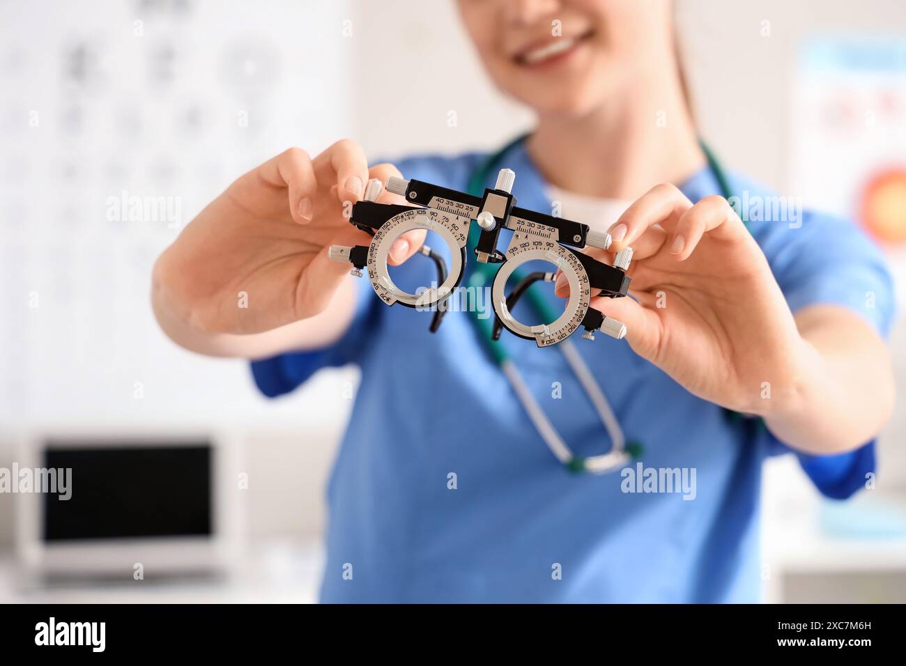 Female ophthalmologist with trial frame in clinic, closeup Stock Photo ...