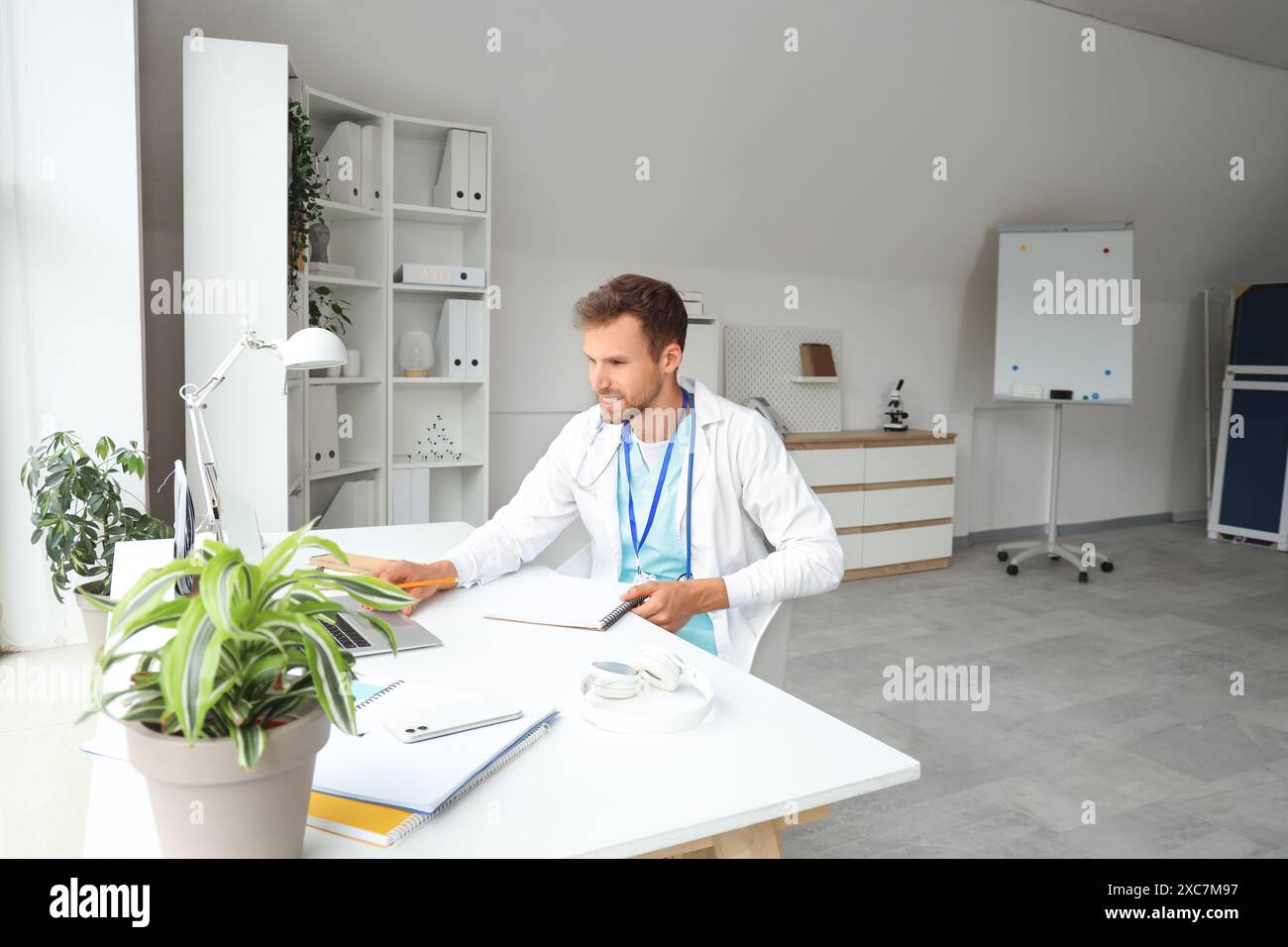Male medical intern studying hi-res stock photography and images - Alamy