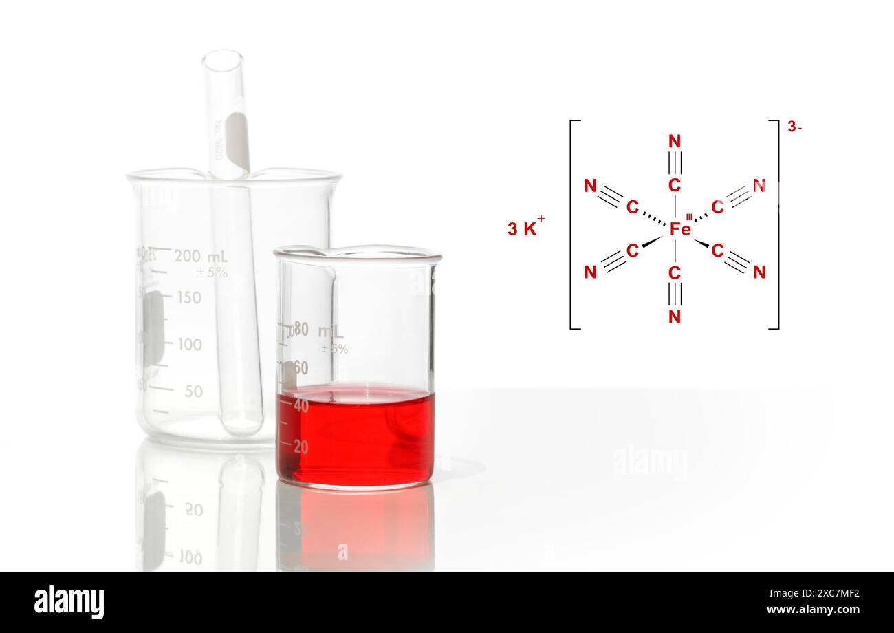 Potassium Ferricyanide liquid in beaker on white laboratory table, with ...