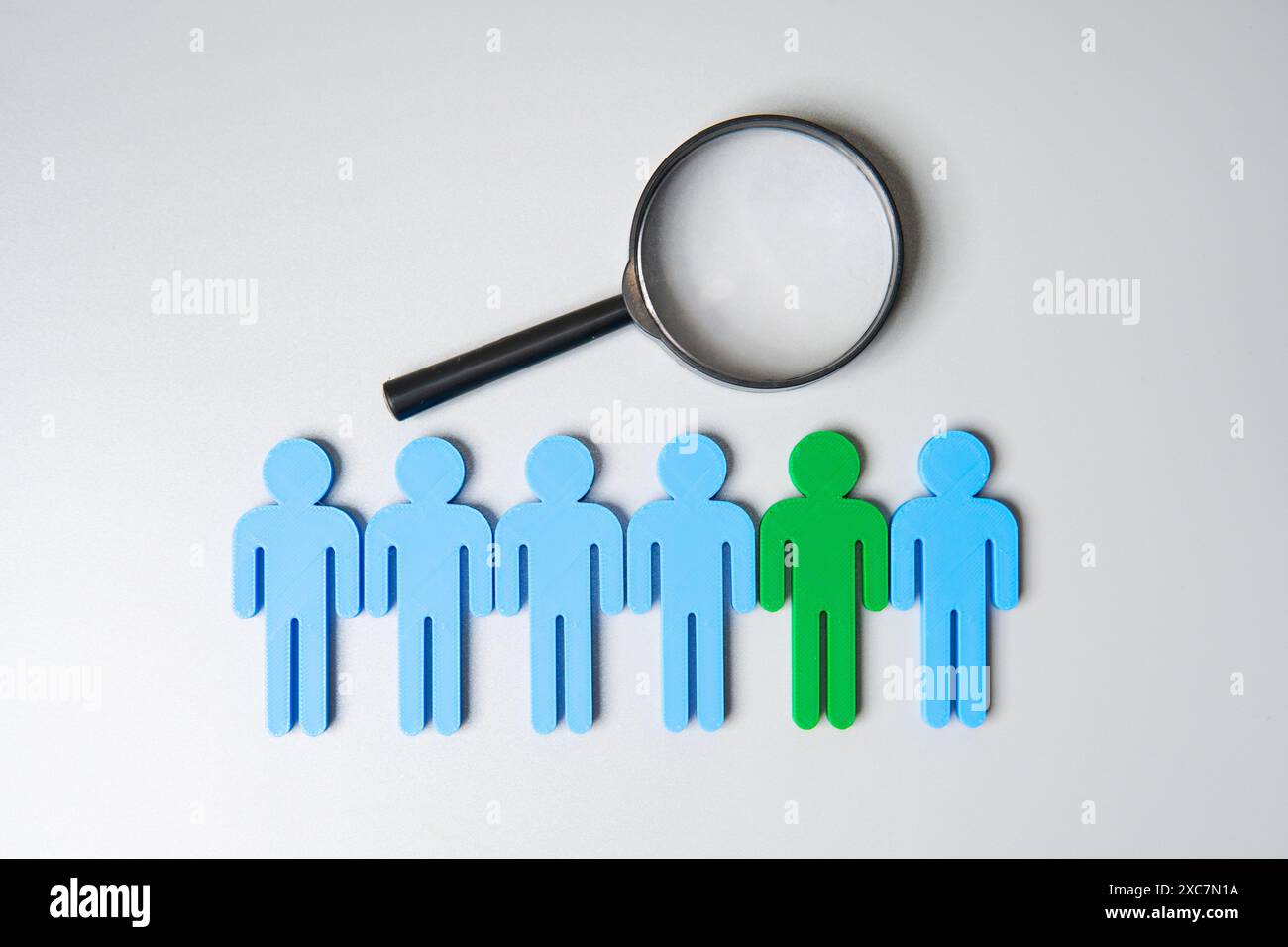 Magnifying glass and human figure. Talent acquisition, target customer ...