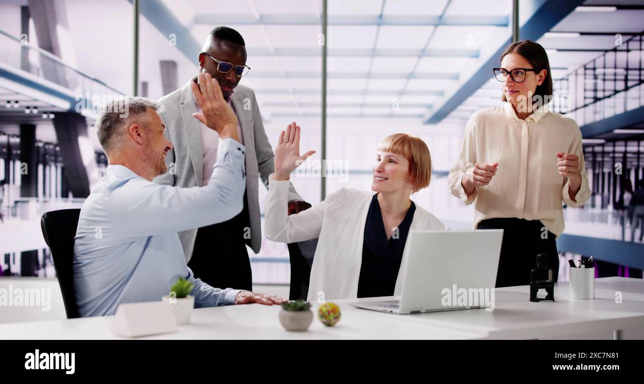 Workers At Workplace High Five. Office Collaboration And Group Spirit ...