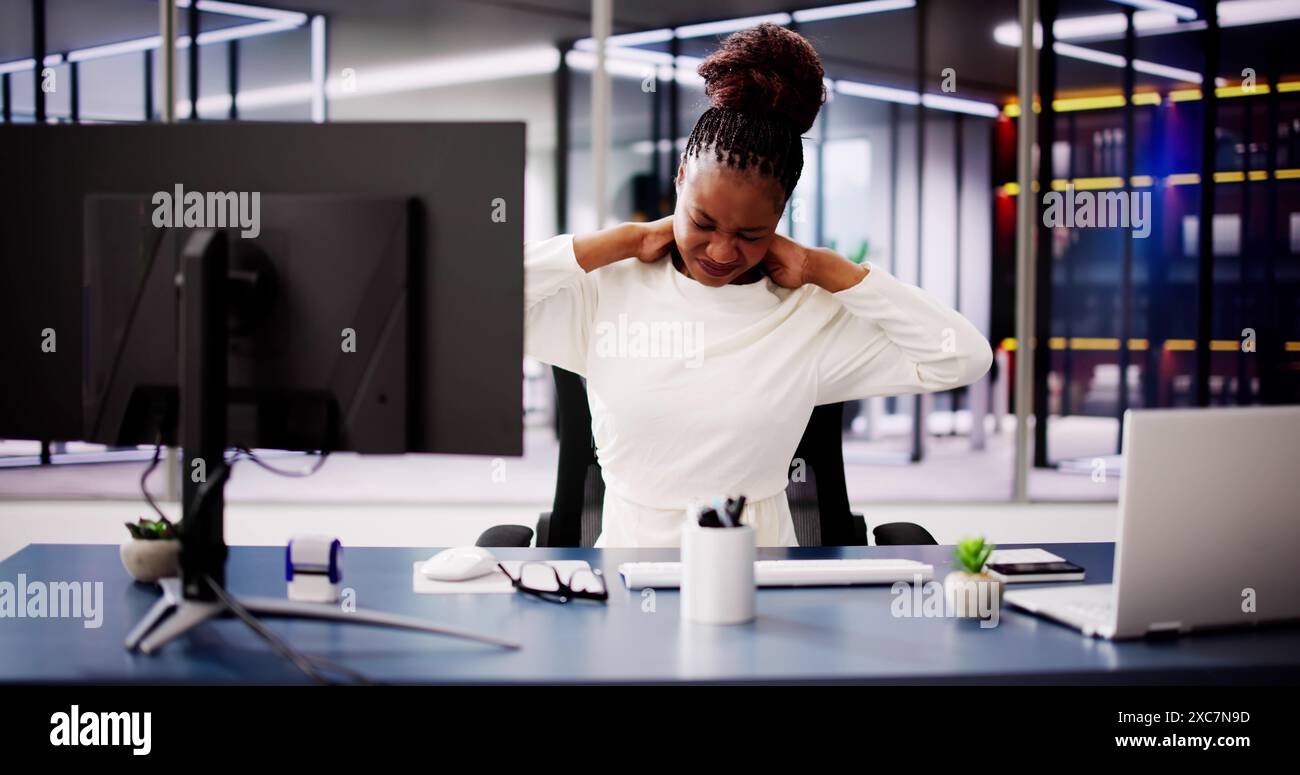 Improving Workplace Wellness: African American Woman Suffers from Poor ...