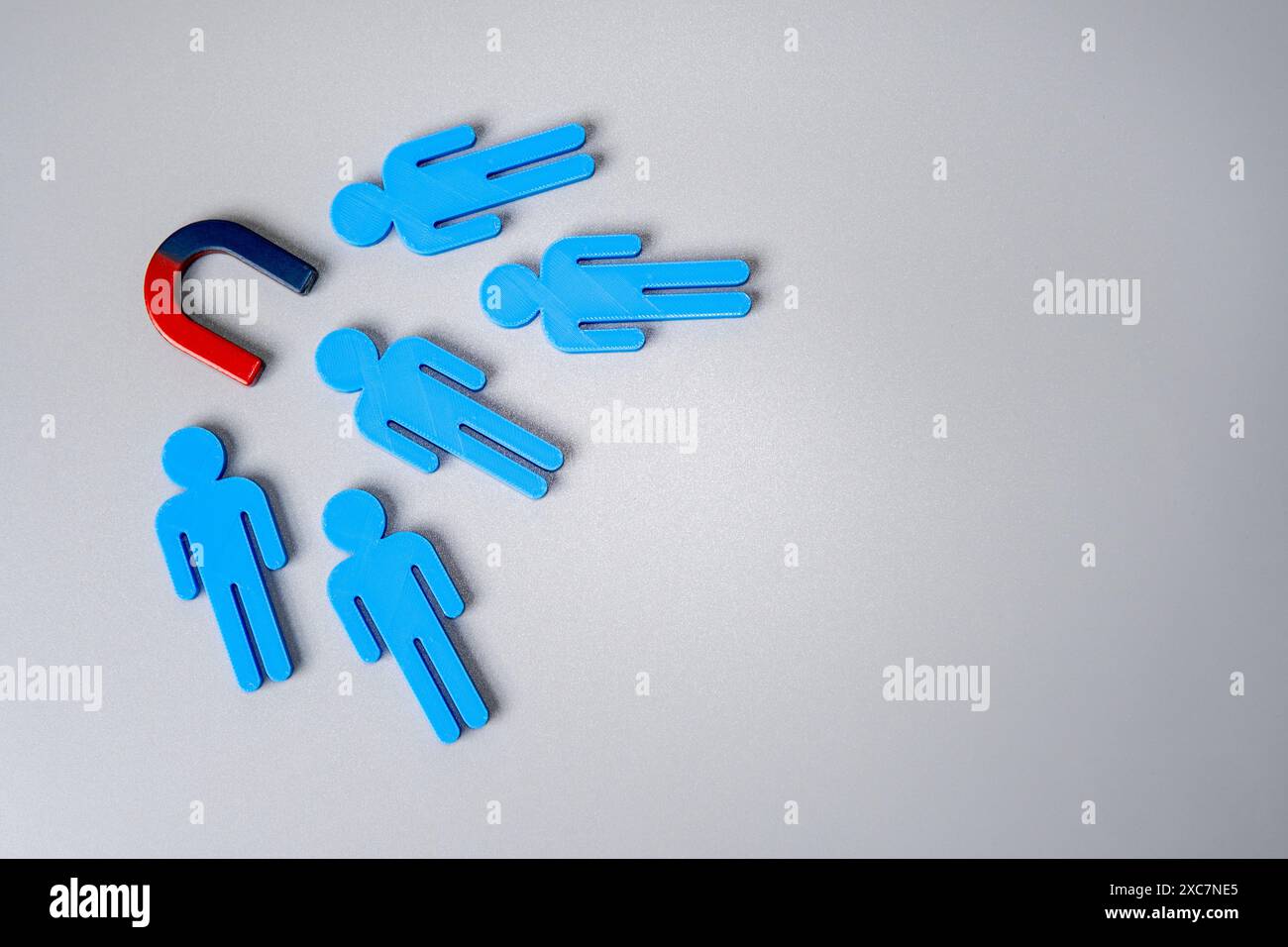 Magnet attracts human figure. Customer acquisition and customer ...