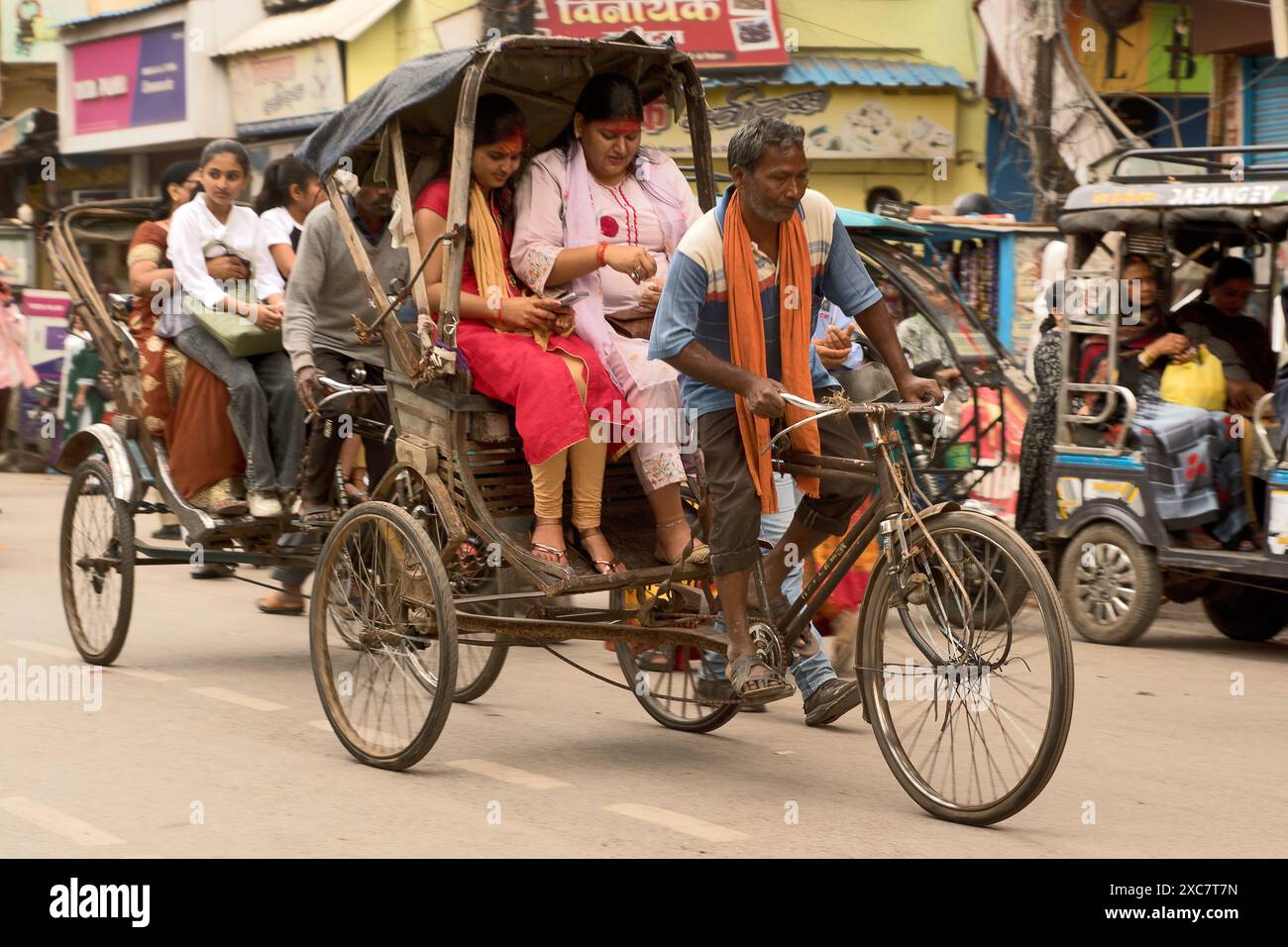 Varanasi, India: bicycle rickshaw. Cycle rickshaws are popular means of ...