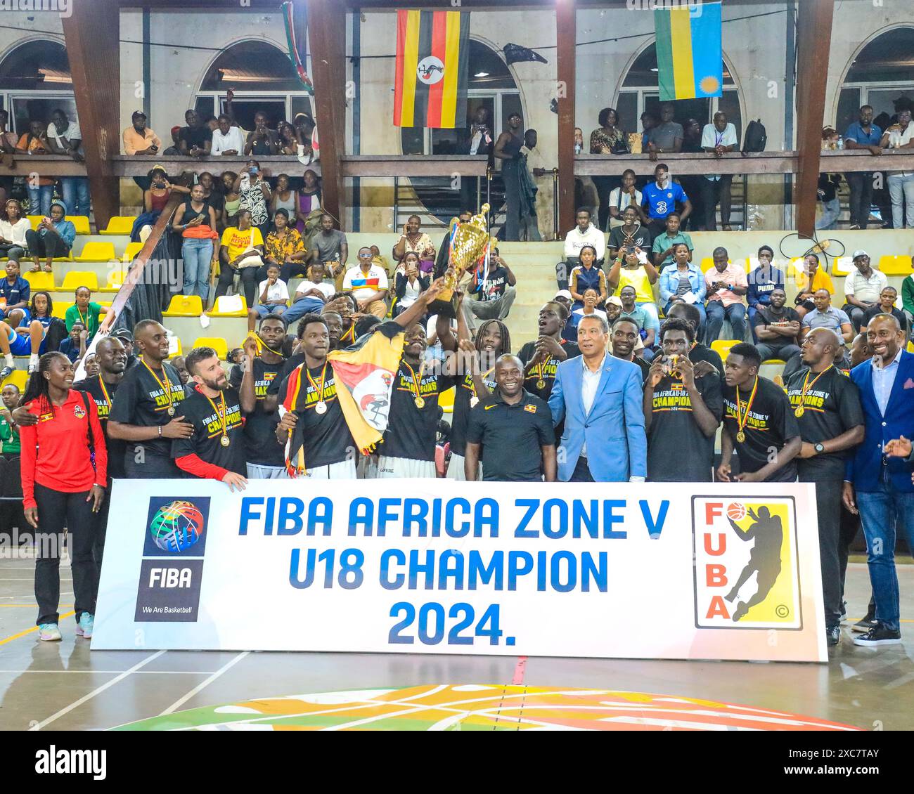 Kampala, Uganda. 14th June, 2024. Winner team Uganda pose with FUBA ...