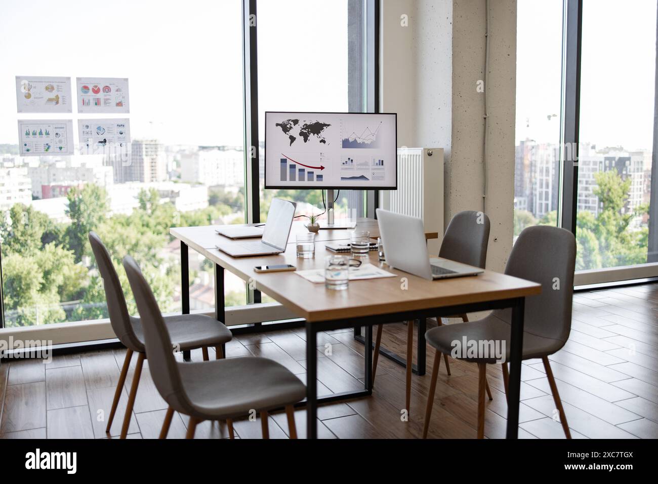 Modern office conference room with charts and graphs displayed Stock ...