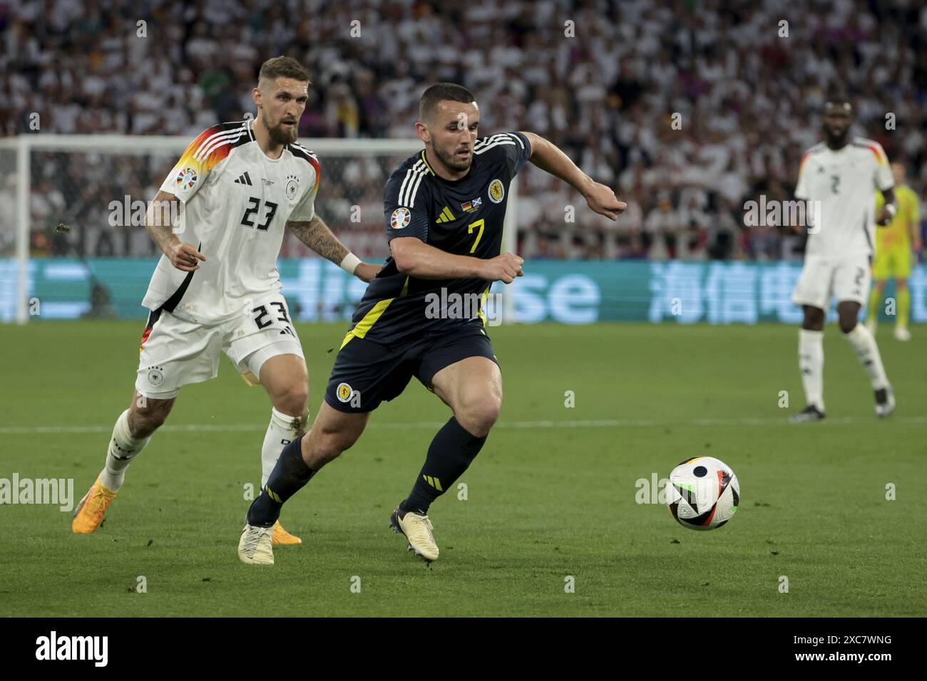 John McGinn of Scotland, left Robert Andrich of Germany during the UEFA ...