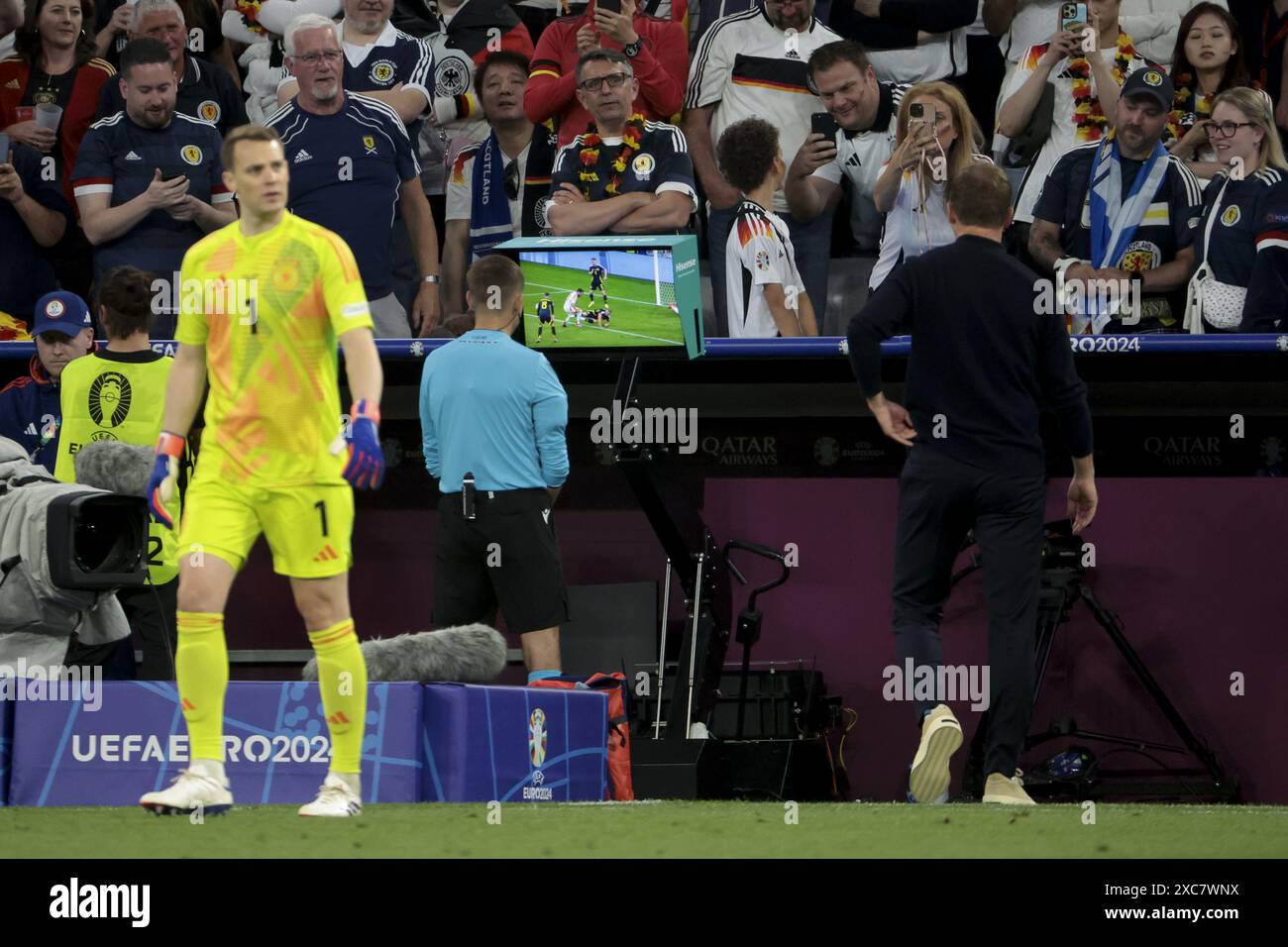 Referee Clement Turpin looks at the VAR during the UEFA Euro 2024 ...