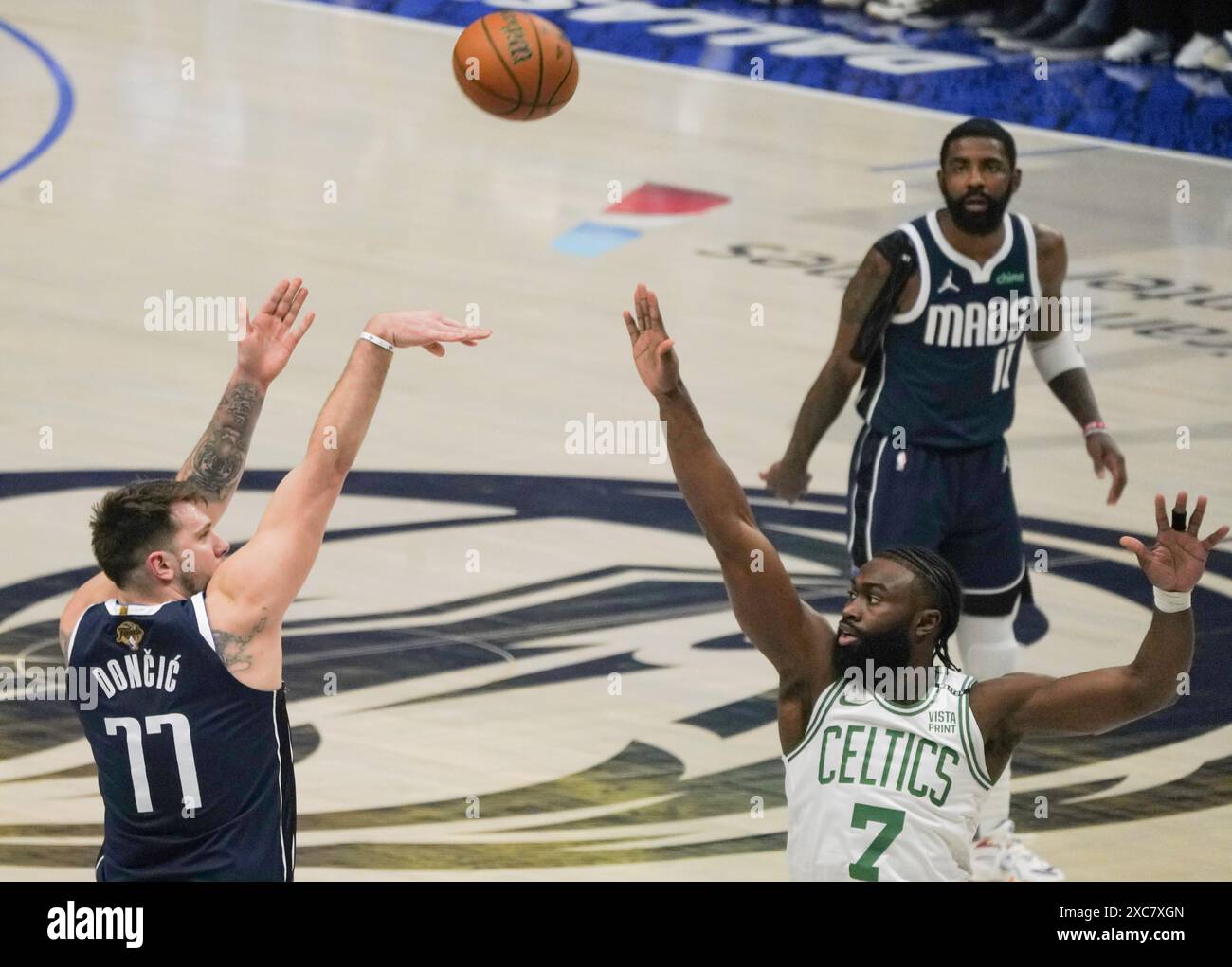 Dallas, USA. 14th June, 2024. Dallas Mavericks' Luka Doncic (L) shoots ...