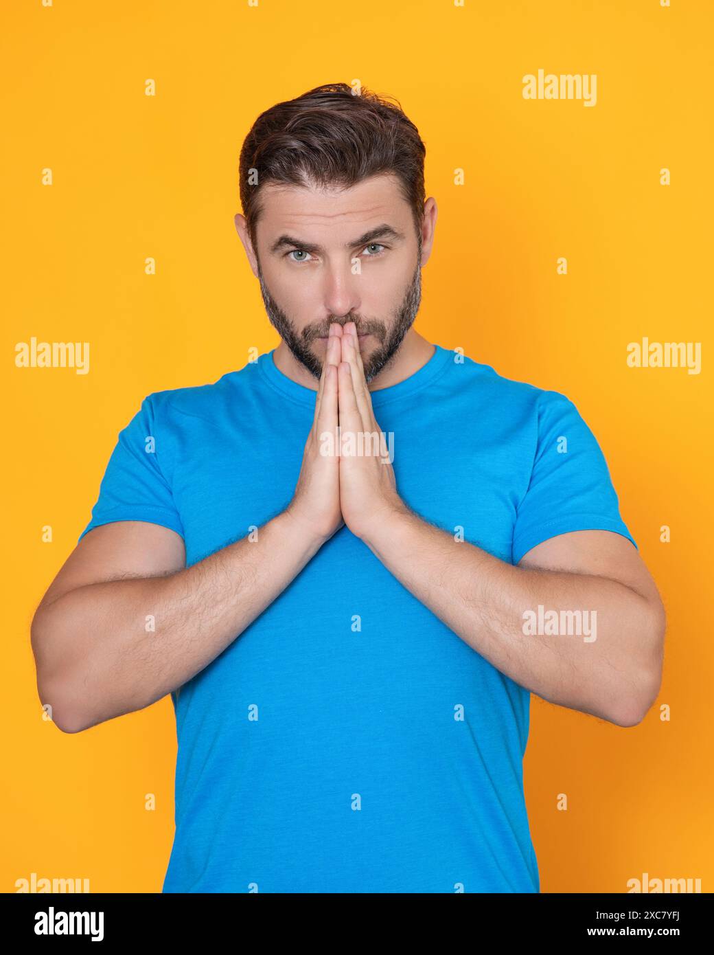Man praying. Isolated portrait of male pray. Praying hands. Religion ...