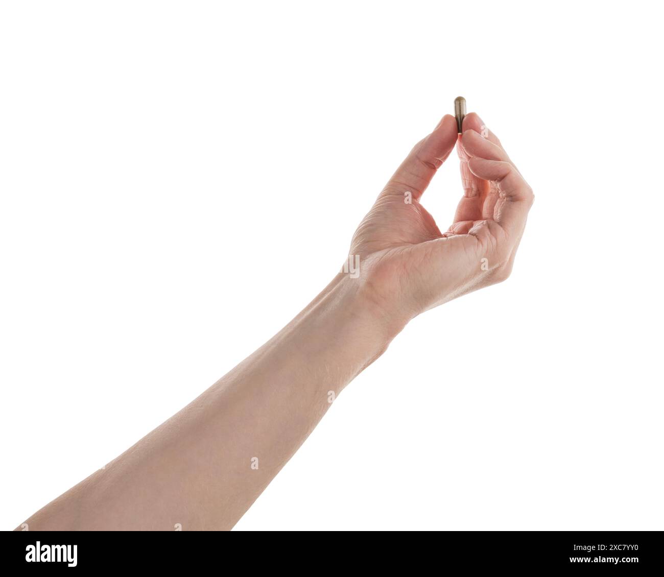 Male hand show brown pill isolated on white background Stock Photo - Alamy