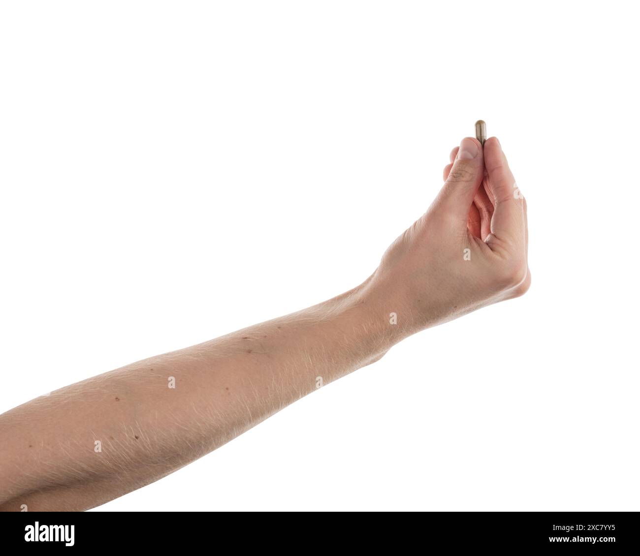 Male hand show brown pill isolated on white background Stock Photo - Alamy