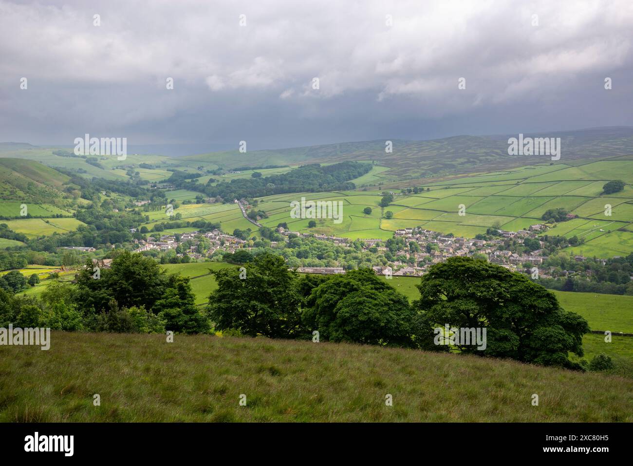 Hills around the village of Hayfield in the Peak District national park ...