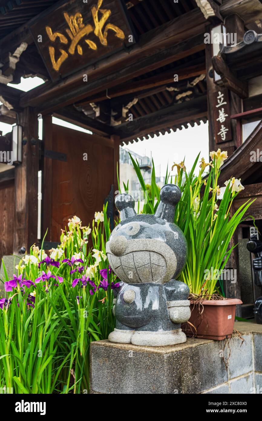 The entrance of Ryuzen-ji temple in Yanaka district, Tokyo, with a ...