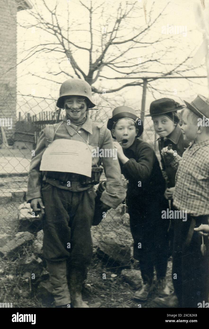 Historic, vintage - 4 little boys plaing to caputure nazi german ...