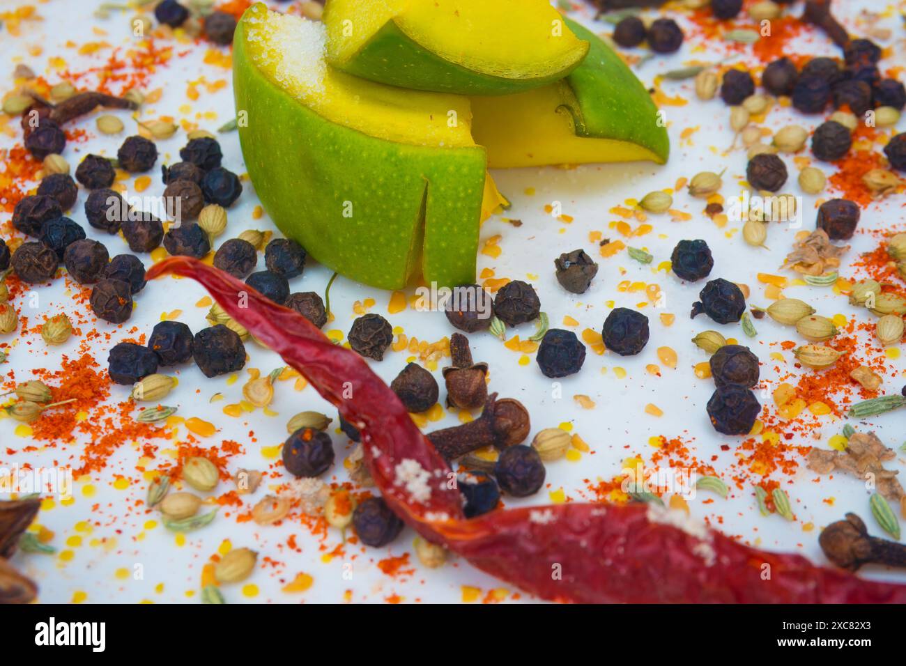 collection of Indian spices used for mango pickle is presented. The ...