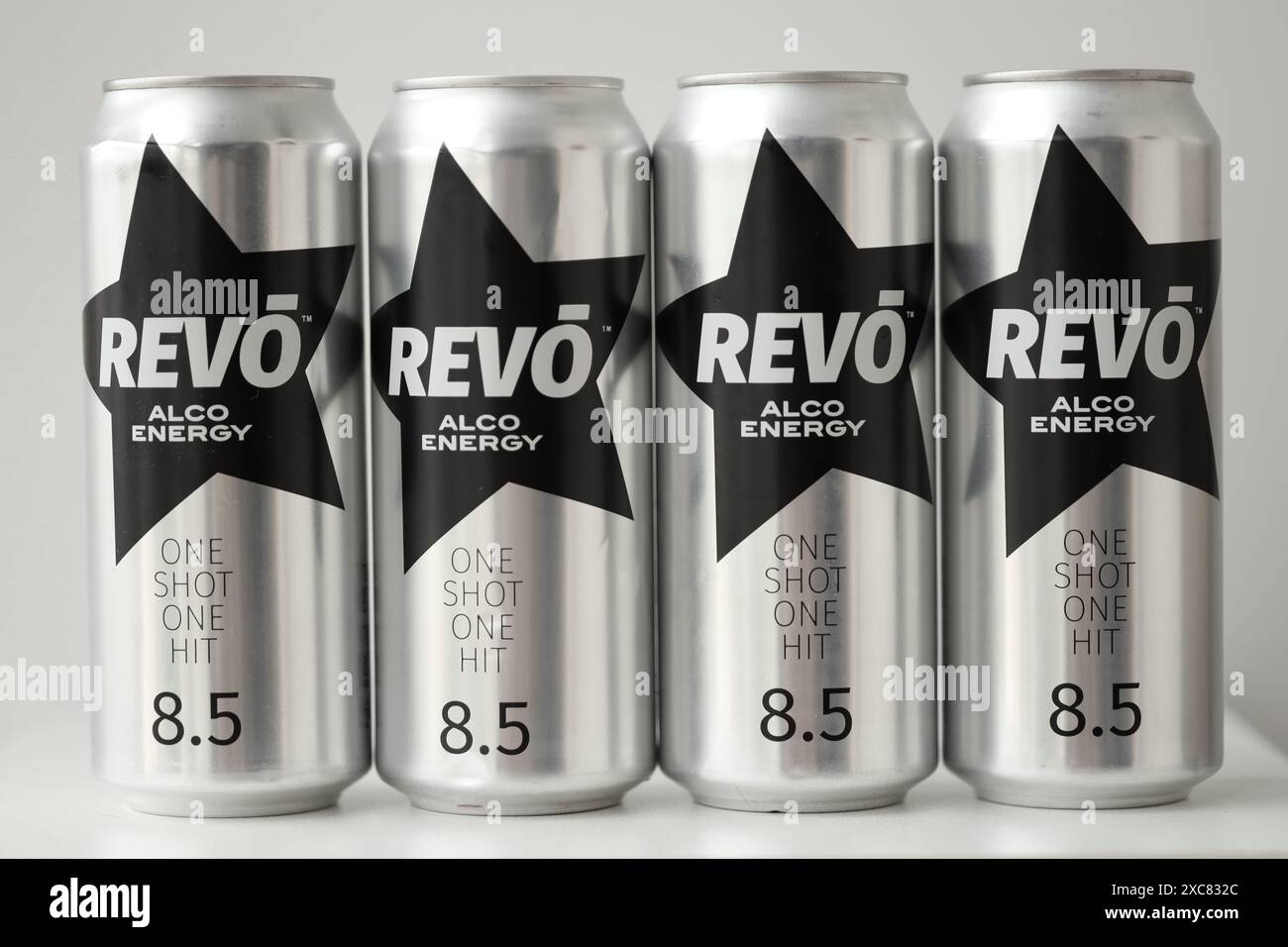 KYIV, UKRAINE - APRIL 20, 2024 Cans of Revo alco energy drink in new ...