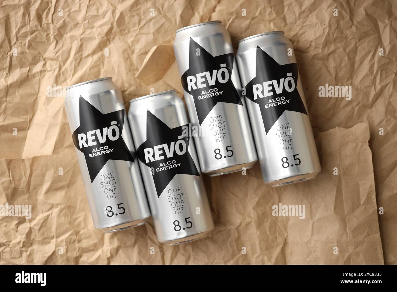 KYIV, UKRAINE - APRIL 20, 2024 Cans of Revo alco energy drink in new ...