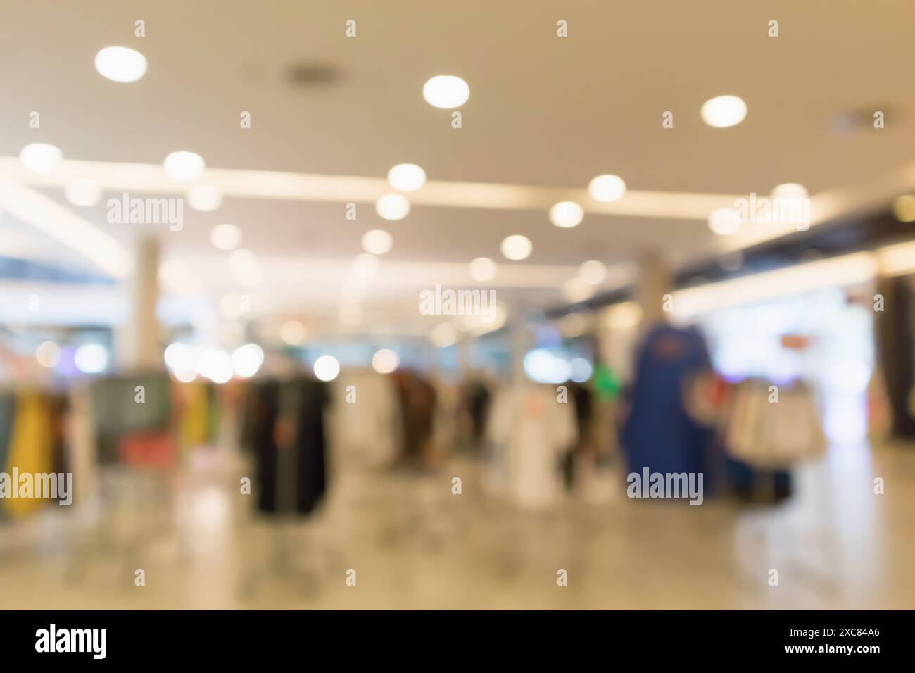 Abstract blur clothing boutique display interior of shopping mall ...