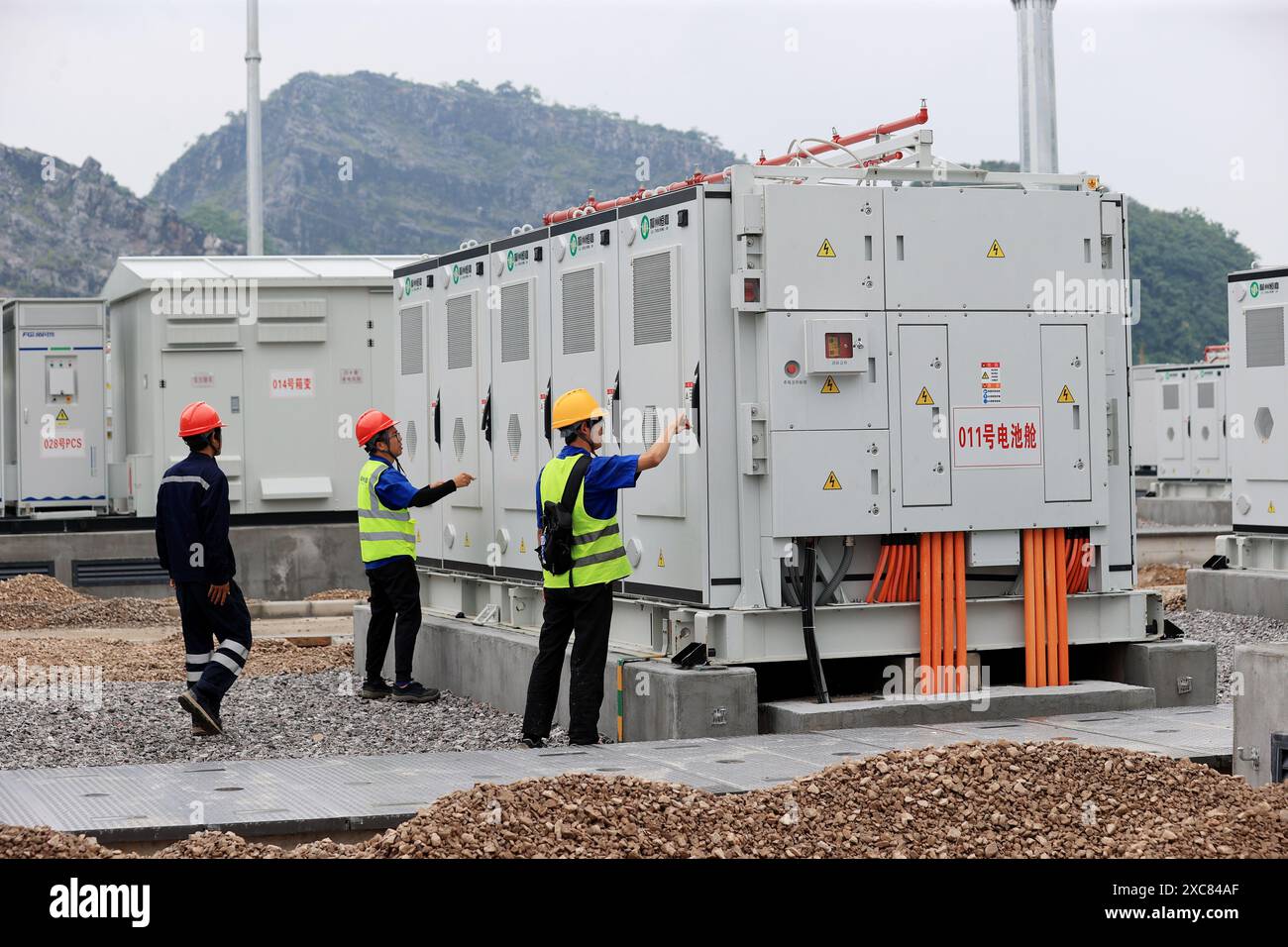LIUZHOU, CHINA - JUNE 12, 2024 - Workers install and debug equipment at ...