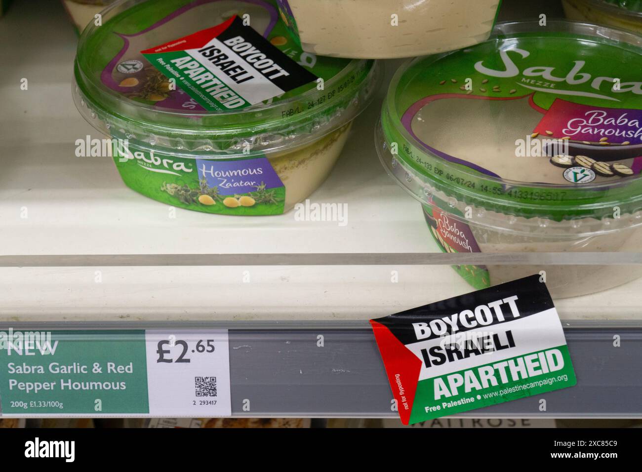 London, UK, 14 June 2024: In a branch of Waitrose in Balham, stickers ...